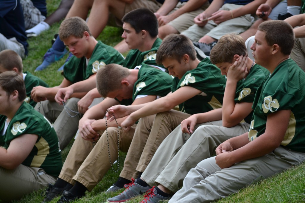 Day before beginning practice, Catholic football teams gather to pray ...