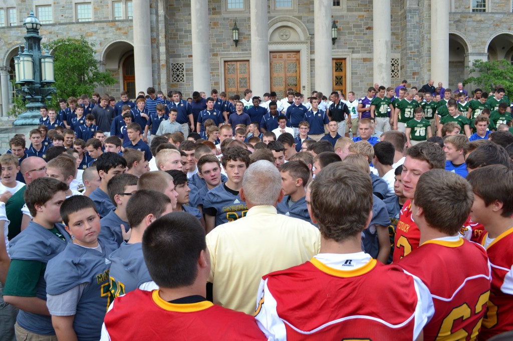 Day before beginning practice, Catholic football teams gather to pray ...
