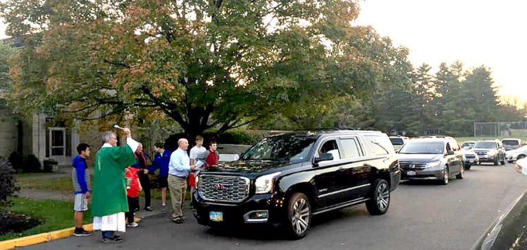 Photo Essay: Annual Car Blessing "Drive-Thru" style. - Catholic Telegraph