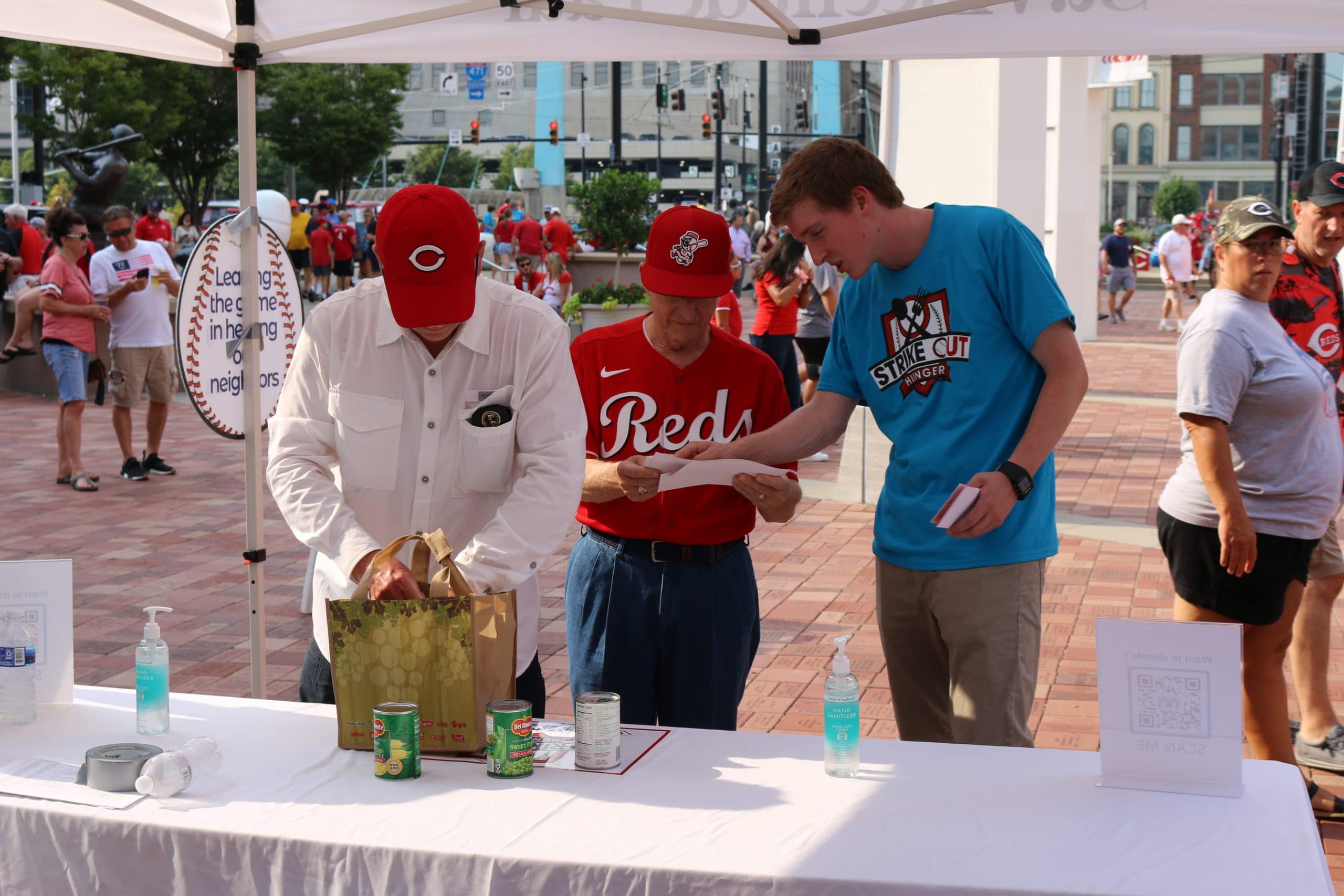 Reds Fans donate 3,000 lbs of Food to Neighbors in Need - Catholic ...
